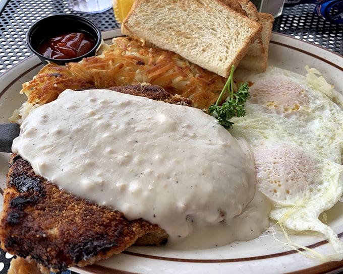Country fried steak smothered in gravy that could make a vegetarian question their life choices. Paired with eggs that sunny side up your entire day. 