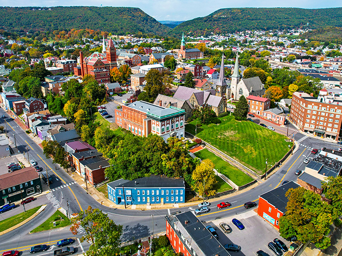 Cumberland's aerial view reveals a city nestled between mountains like a precious stone in nature's jewelry box.