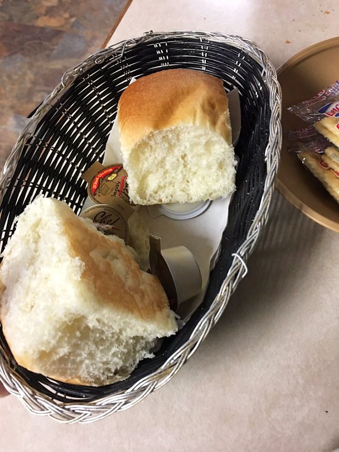 Pillowy dinner rolls that would make your grandmother jealous, served warm and ready for that essential pre-chicken carb loading.
