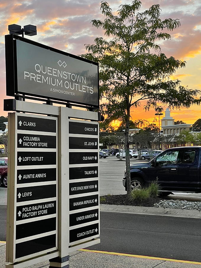 The directory sign at sunset&mdash;a retail rosetta stone guiding shoppers through this labyrinth of bargains as day gives way to evening.