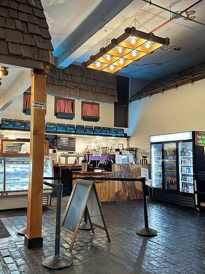 Rustic wooden beams, shingle accents, and thoughtful lighting create an atmosphere that makes even waiting in line a pleasant part of the experience.