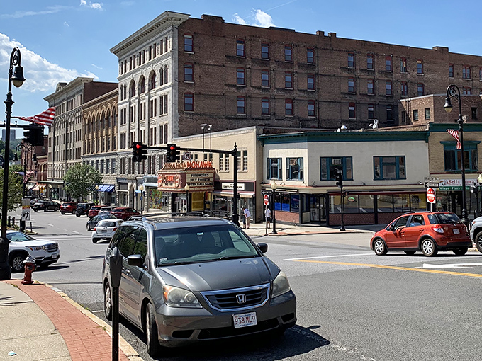 Downtown North Adams buzzes with activity beneath the watchful gaze of surrounding Berkshire hills, an affordable paradise for those seeking small-town charm.