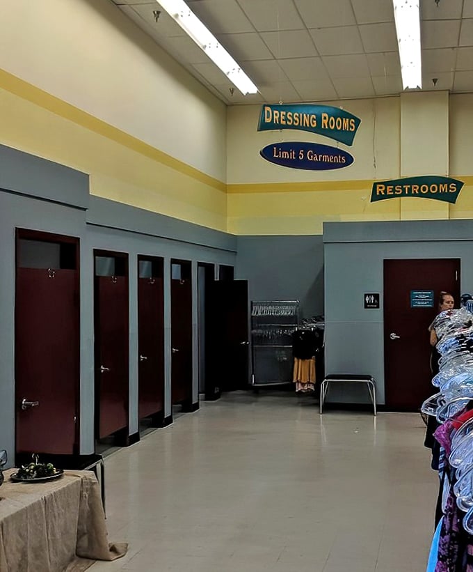 The dressing room area&mdash;where fashion dreams are tested against reality with a five-garment limit and fluorescent lighting honesty.