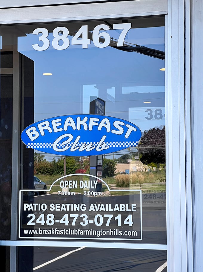 The door proudly displays operating hours and contact information &ndash; essential knowledge for planning your next breakfast pilgrimage.