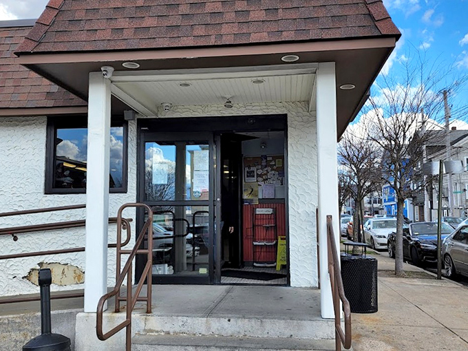 The entrance to pizza paradise&mdash;a humble doorway that's welcomed countless Rhode Islanders seeking comfort in carbohydrate form.