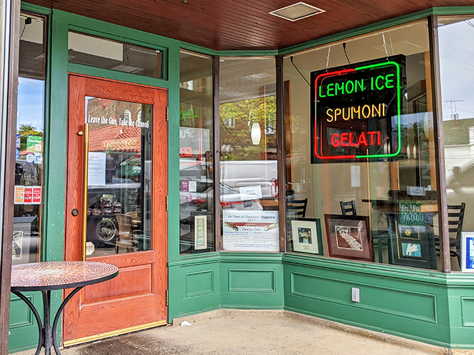 The entrance to carb paradise&mdash;complete with neon promises of lemon ice, spumoni, and gelati. That green door might as well be labeled "Point of No Return."