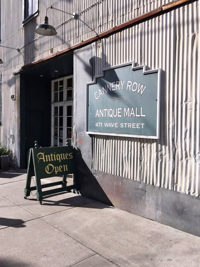 The sign promises antiques, but what it delivers is an adventure. That sandwich board has lured more treasure hunters than a pirate's map.