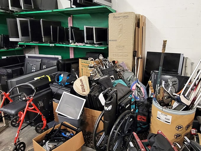 The island of misfit electronics—where yesterday's technology awaits tomorrow's tinkerer. That red walker is making a break for the exit.