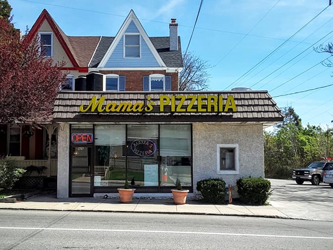 The street view reveals Mama's true character&mdash;a neighborhood institution nestled among residential homes, serving its community one perfect sandwich at a time.