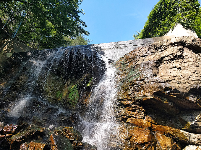 The waterfall doesn't roar so much as it sings, cascading over ancient rock formations. Nature's spa treatment&mdash;the original sound machine for stressed-out souls.