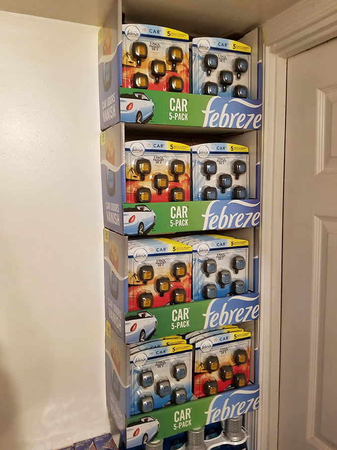 Car fresheners stacked with military precision&mdash;because even at a flea market, organization can be as satisfying as the deals themselves.