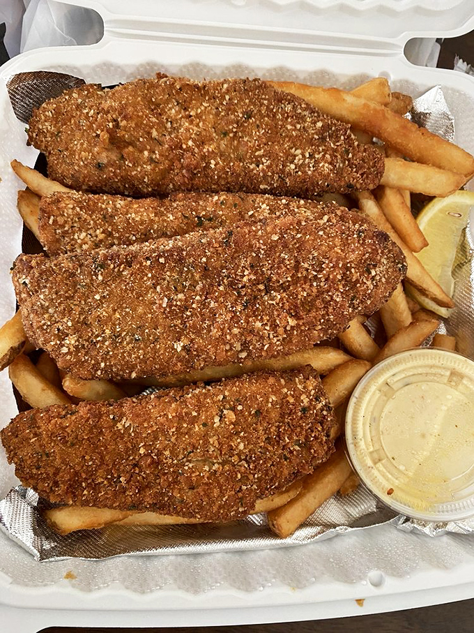 Fish and chips, Maryland-style. That crispy coating isn't just breading&mdash;it's armor protecting the tender fish within until the perfect first bite.