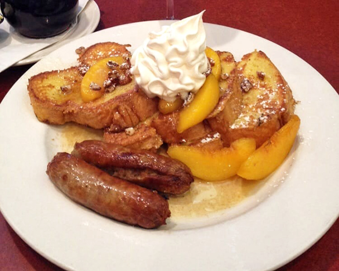 French toast with caramelized peaches and whipped cream that makes ordinary breakfast feel like dessert you're allowed to eat before noon.