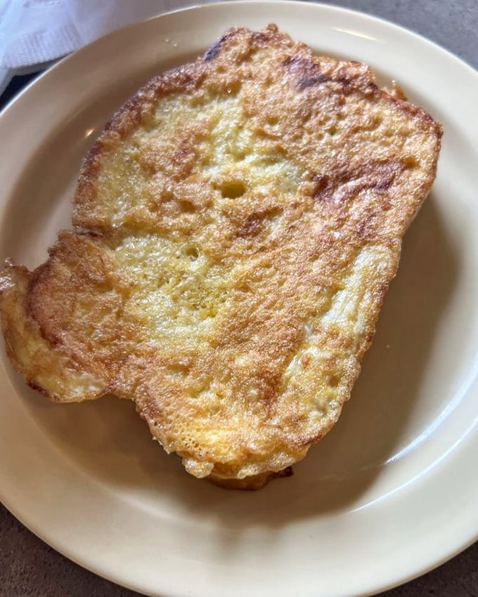French toast that's achieved the perfect golden-brown exterior while maintaining its custardy soul. Breakfast alchemy at its finest, no fancy equipment required.