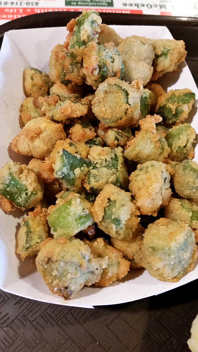 Fried okra &ndash; those golden-battered Southern gems that prove vegetables can be just as indulgent as dessert when treated with proper respect.
