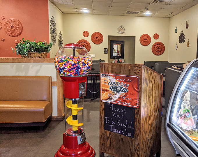 The gumball machine stands guard at the entrance, a sweet sentinel promising that childlike joy awaits diners of all ages.