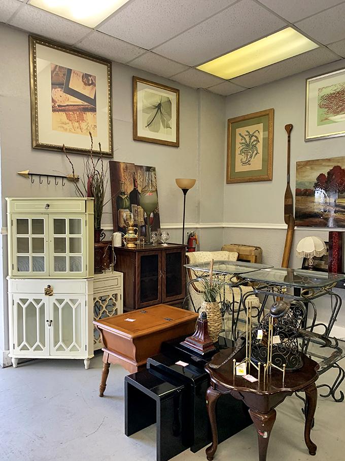 The furniture room's sophisticated corner. That white cabinet could hold your grandmother's china or become your new bar&mdash;versatility at its finest.
