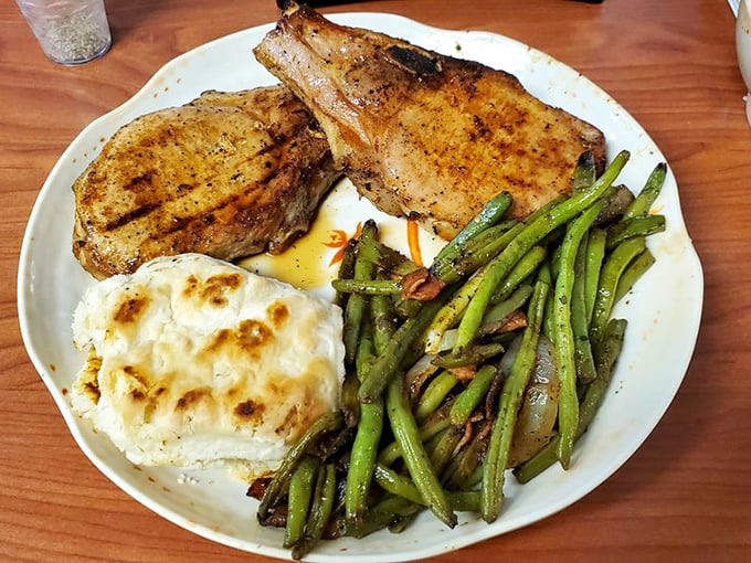 These pork chops have achieved what we all aspire to: perfection without pretension. The charred edges tell stories of flame-kissed excellence.