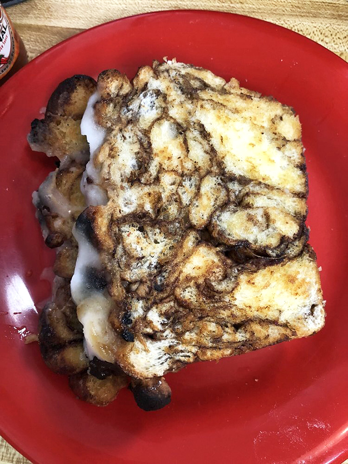Grilled cinnamon swirl bread transformed into a sandwich that blurs the line between breakfast and dessert&mdash;a sweet rebellion against boring food that Michigan has embraced wholeheartedly.