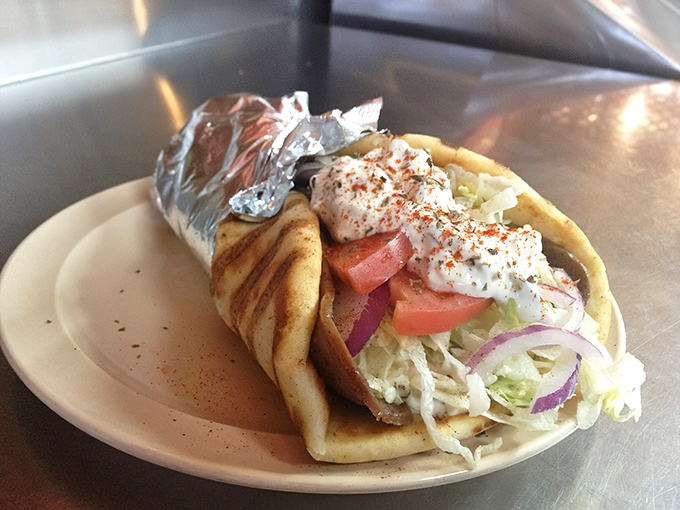 A proper gyro isn't just a sandwich&mdash;it's a handheld miracle of tzatziki, fresh vegetables, and seasoned meat wrapped in warm pita. 