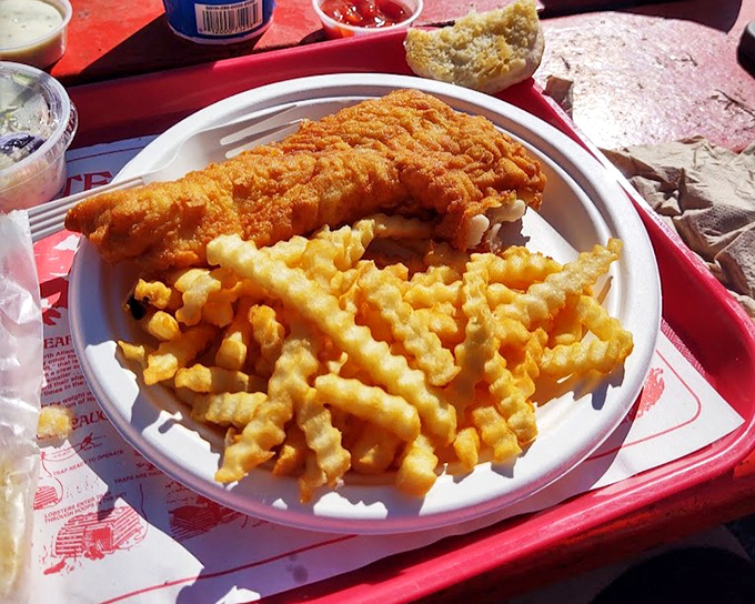 Golden-fried haddock with crinkle fries &ndash; proof that simplicity, when done right, outshines complexity every time. Crispy perfection awaits.