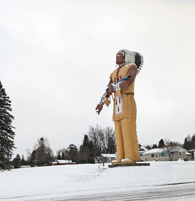 Even buried in snow, Hiawatha stands unfazed &ndash; the ultimate "this is fine" meme in statue form during Michigan's brutal winters.