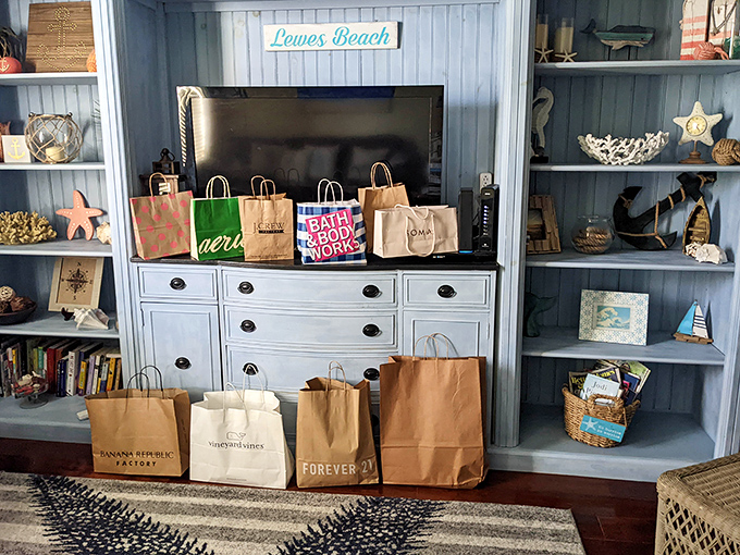 The aftermath of a successful outlet expedition: shopping bags from Banana Republic, White House Black Market, and more await the journey home.