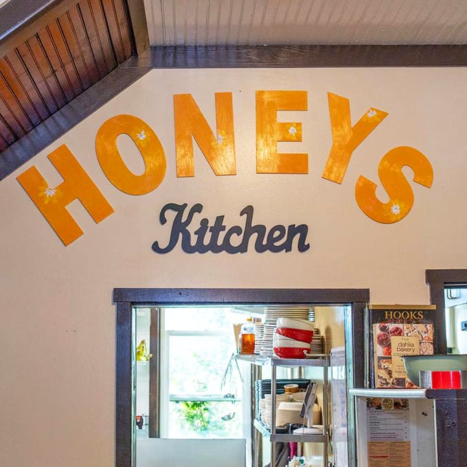 "Honey's Kitchen" glows in golden letters above the pass-through window, promising home-style comfort food that grandma would approve of.