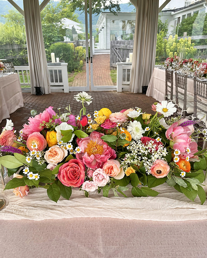 Fresh flowers arranged with artistic flair bring mountain beauty indoors, perfect for celebrations or just brightening an ordinary Tuesday afternoon.