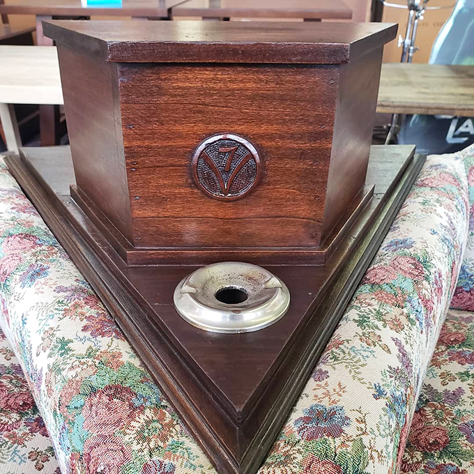 This wooden humidor with its distinctive emblem once held someone's prized cigars, now waiting for a second life as a treasure box.