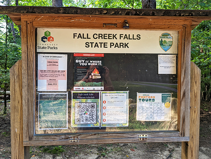 The park's information board stands like a friendly forest concierge, ready to guide you through Tennessee's most spectacular natural playground.