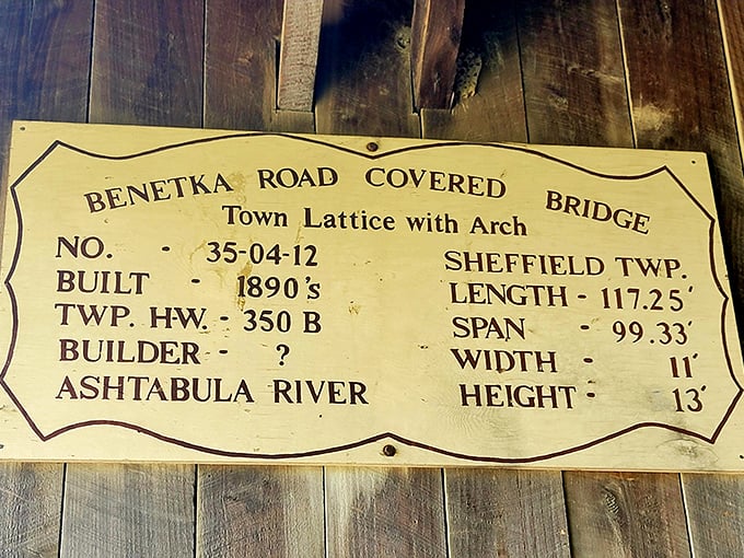 History condensed into a single plaque. Built in the 1890s, spanning 117.25 feet&mdash;numbers that barely capture the bridge's true significance.