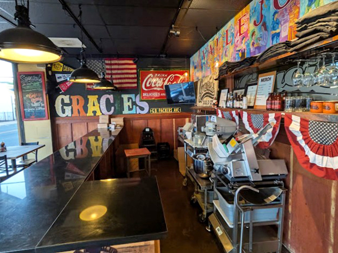 American flags, Coca-Cola signs, and BBQ equipment &ndash; the holy trinity of authentic smokehouse decor that signals you're in for the real deal.