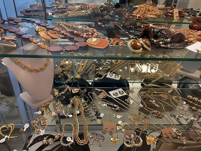 Jewelry displayed like buried treasure &ndash; some costume, some possibly valuable, all with stories to tell. That vintage brooch could be your next conversation starter. 