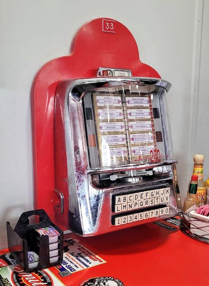 A vintage jukebox ready to soundtrack your meal with the greatest hits from America's golden age. 