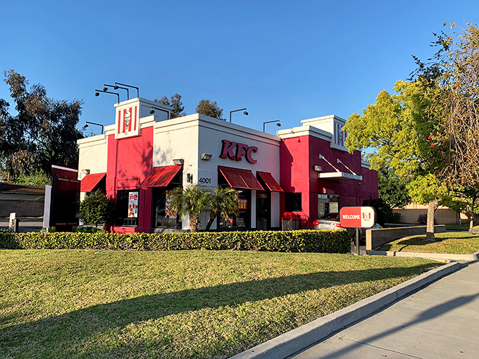 The Colonel's red roof signals familiar comfort food ahead, because sometimes you need something reliably crispy and uncomplicated.
