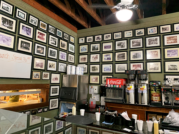 A wall of photographs chronicles decades of community moments &ndash; visual proof that good food has been bringing people together here for generations.