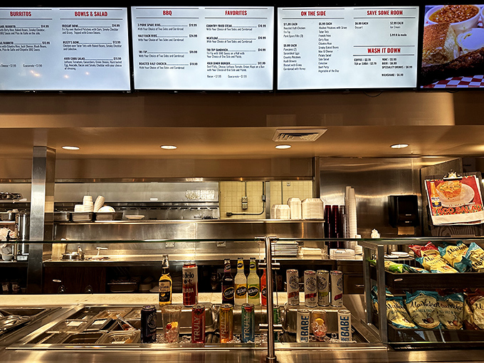 Where the magic happens! The gleaming kitchen line stands ready to transform simple ingredients into memorable meals that keep locals coming back.