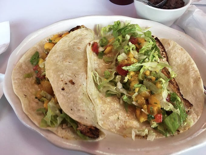 Fish tacos bursting with fresh ingredients and vibrant colors&mdash;proof that Georgie's diner skills extend well beyond the breakfast hours.