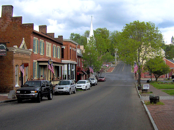 Jonesborough's Main Street rises toward a white church steeple, creating the kind of small-town vista that Hollywood tries desperately to recreate on soundstages.