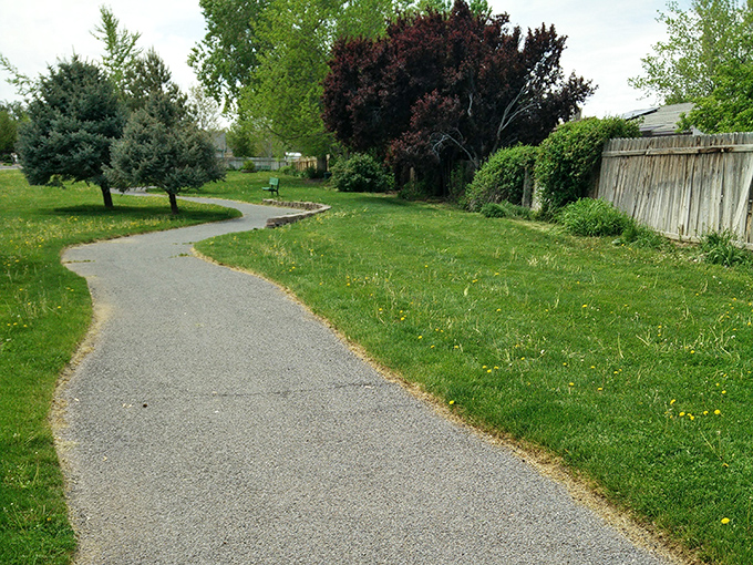 Walking paths wind through neighborhoods where you can stroll safely, greeting neighbors instead of dodging aggressive joggers wearing eighty-dollar yoga pants.