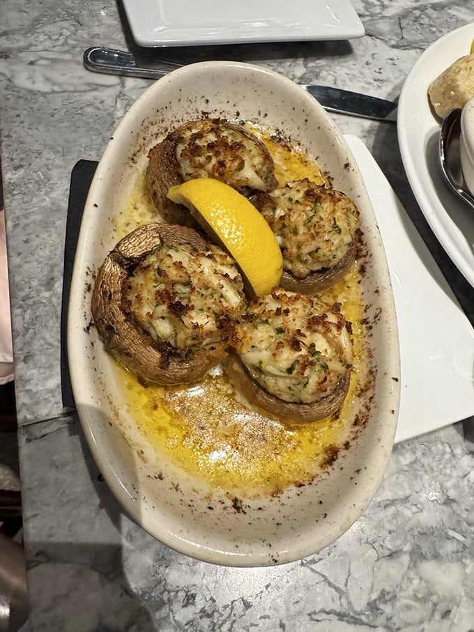 These mushroom caps stuffed with crab are like little boats of flavor sailing in butter &ndash; proof that sometimes the best things come in small packages.