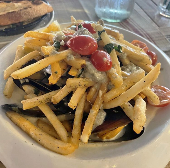 Mussels and frites proving that some classic combinations never go out of style, especially with that golden crispy coating.