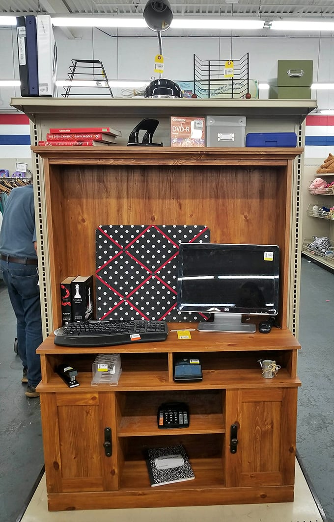 That entertainment center has seen things. Now it waits for its second act in your home office or vintage-inspired living room.