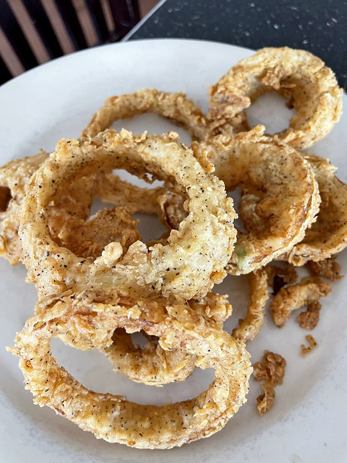Onion rings that shatter with each bite&mdash;crispy, golden halos that make you wonder why anyone would ever settle for the frozen kind.