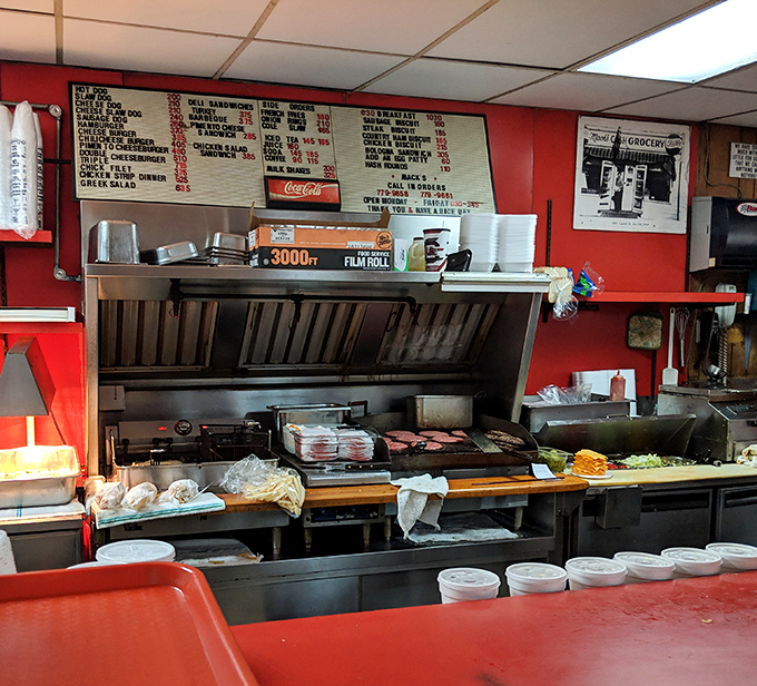 Where the magic happens&mdash;this open kitchen has no secrets, just decades of burger-making wisdom and a flat-top grill seasoned with history.