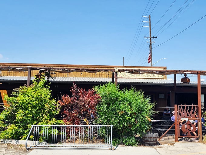 Lucky 13's outdoor seating area &ndash; where fresh air makes the burgers taste even better. Those metal chairs have supported countless food comas.