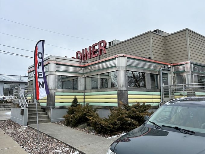 The "OPEN" flag waves like a friendly hello, inviting passersby to experience what might be the best breakfast decision they'll make all year.