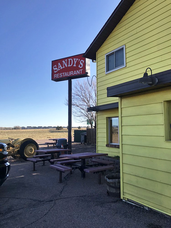 Even the outdoor seating area says, "Stay awhile, partner." Those picnic tables have heard some stories over the years.