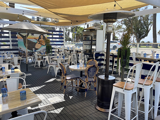 The outdoor patio where ocean breezes, sunshine, and fresh seafood combine to create the quintessential California coastal dining experience.